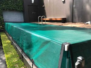 Bespoke_pool_cover_glass_infinity_edge - Just Covers